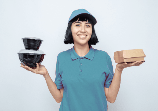smiling-young-caucasian-delivery-girl-holding-food-containers-paper ...